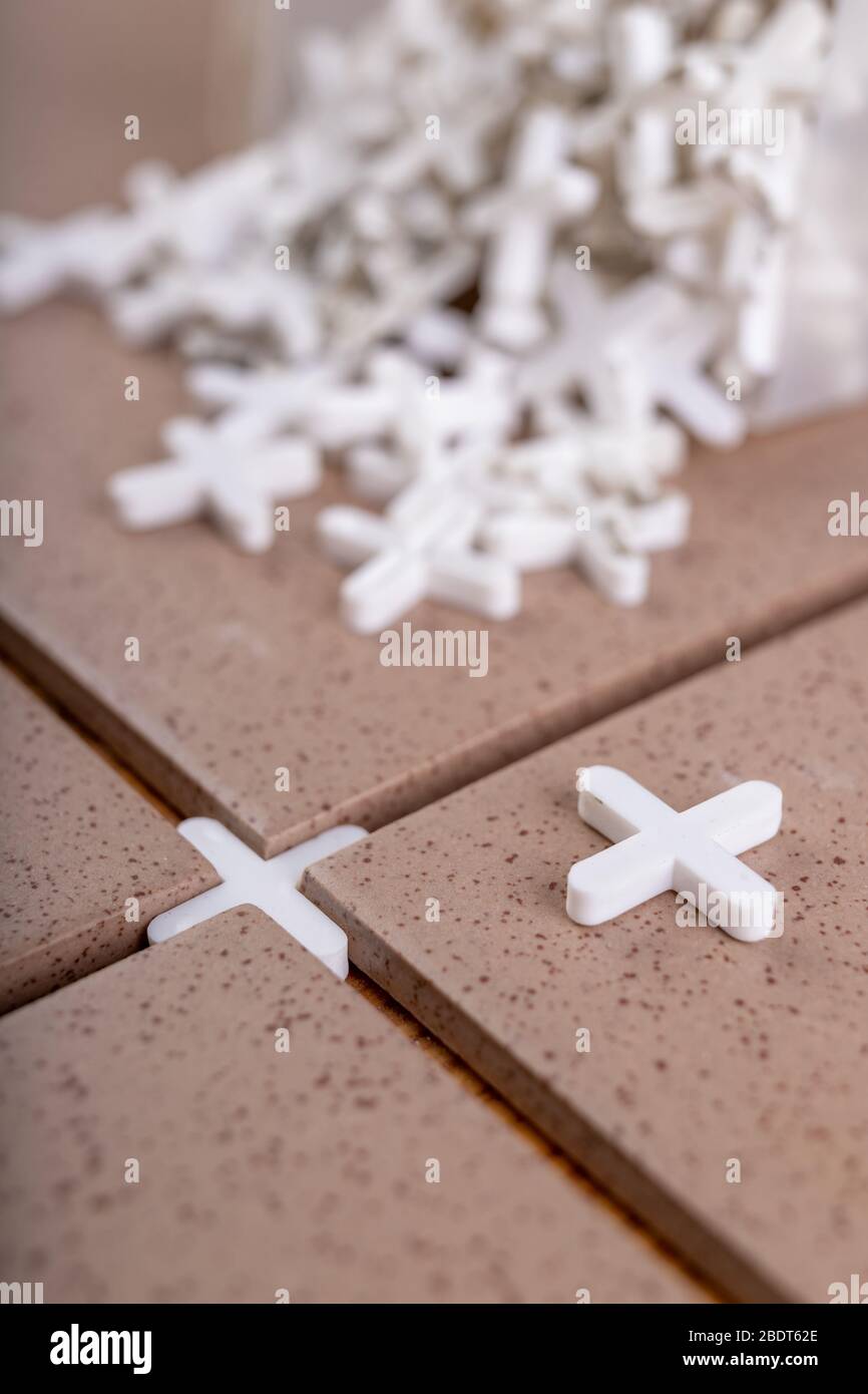 Industrial tiles and plastic crosses for tiling. Accessories for ...