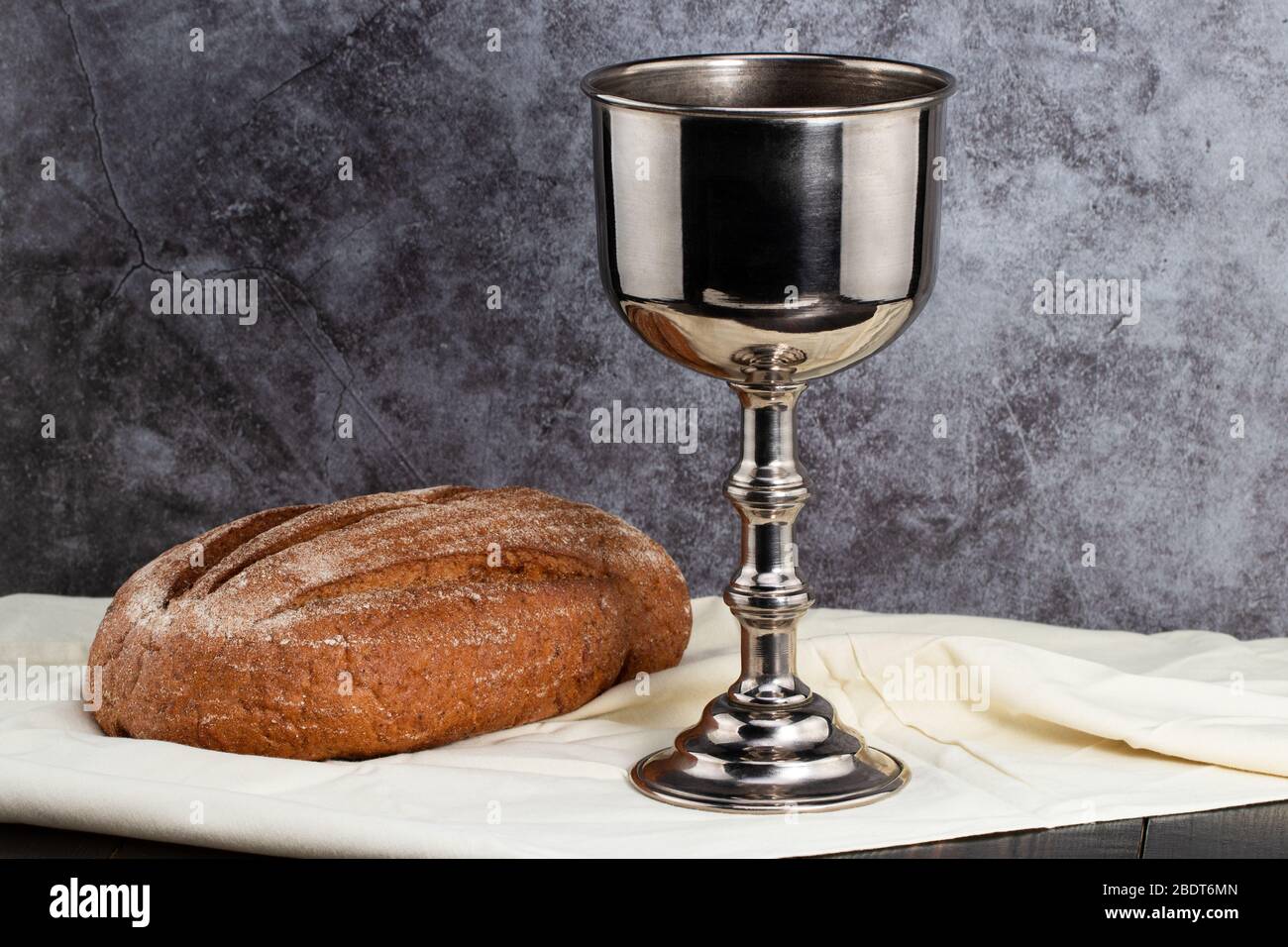 holy communion chalice with wine and bread Stock Photo - Alamy