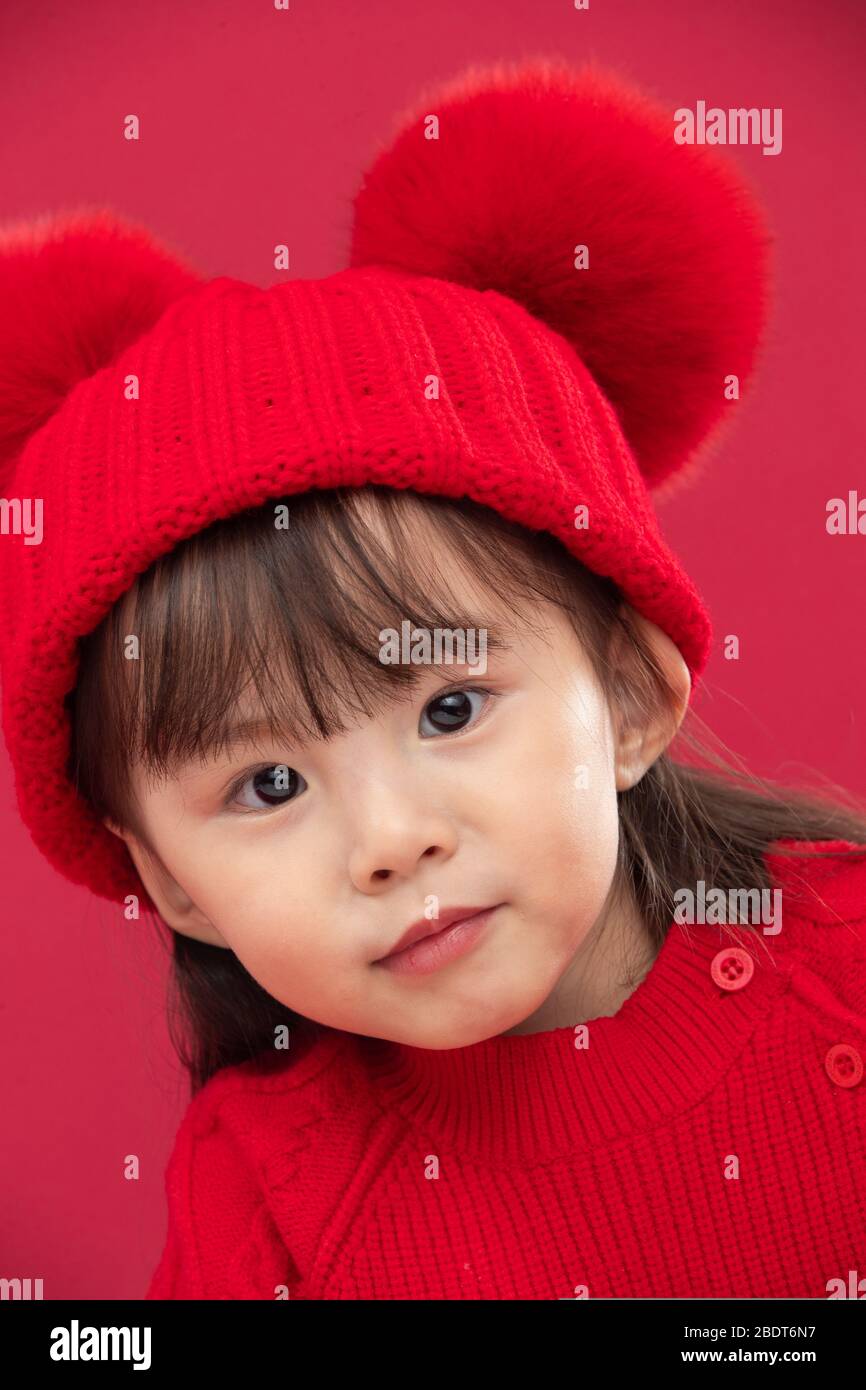 Happy little girl bust features Stock Photo - Alamy