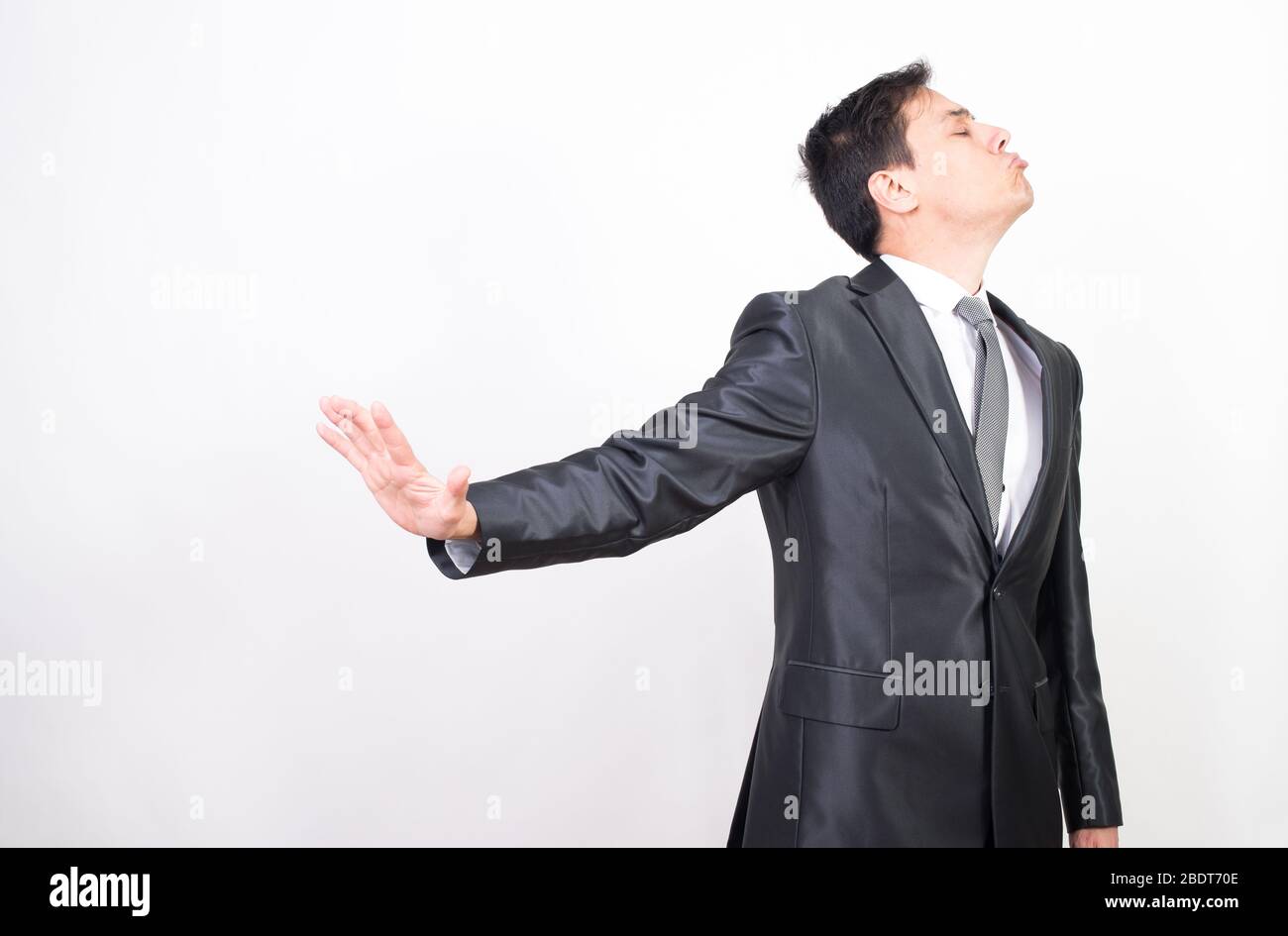 Angry man in suit. white background, medium shot Stock Photo - Alamy