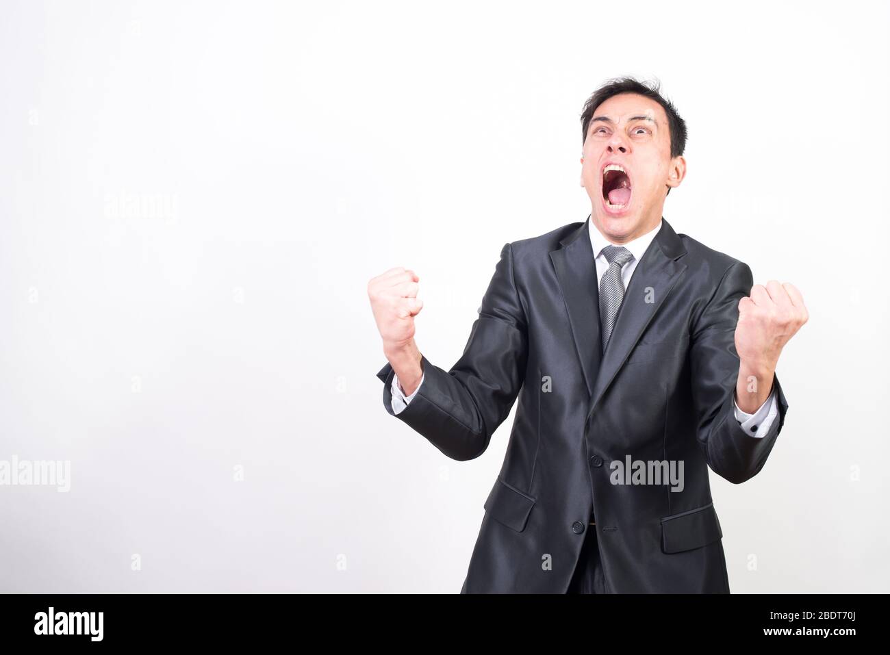 Hysterical man in suit hi-res stock photography and images - Alamy