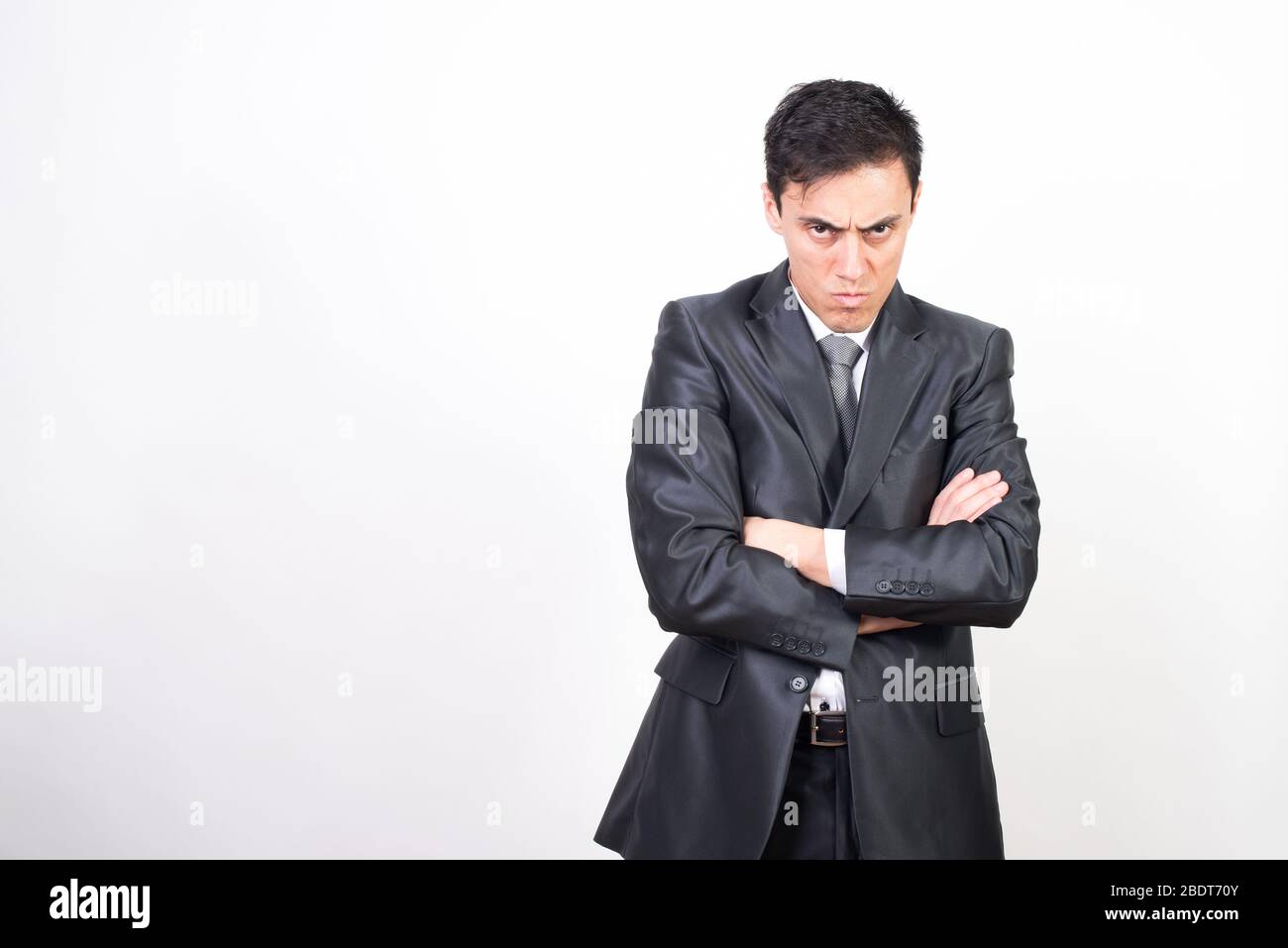 Angry man in suit. white background, medium shot Stock Photo - Alamy