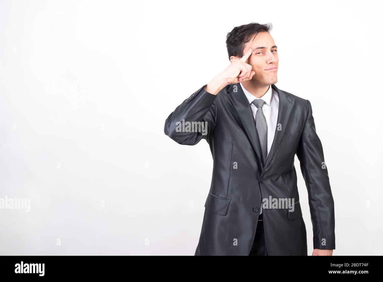 Clever man in suit. White background, Medium shot Stock Photo - Alamy
