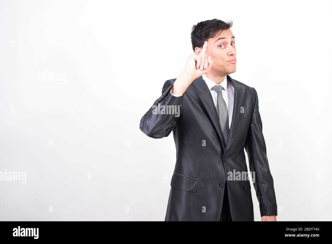 Clever man in suit. White background, Medium shot Stock Photo - Alamy