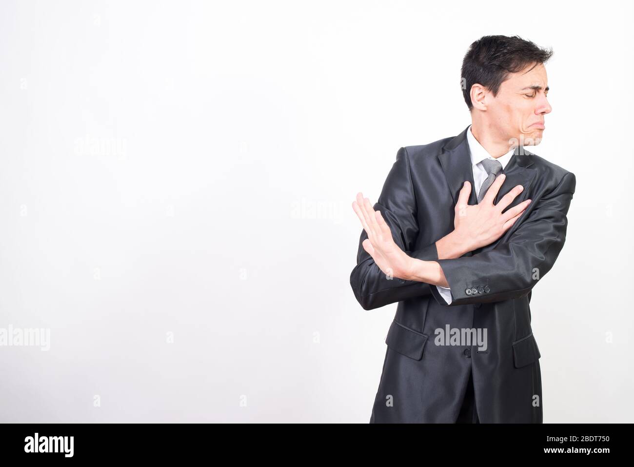 Angry man in suit. white background, medium shot Stock Photo - Alamy