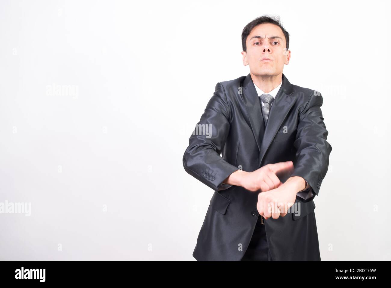 Tired of waiting man in suit. White background, Medium shot Stock Photo ...