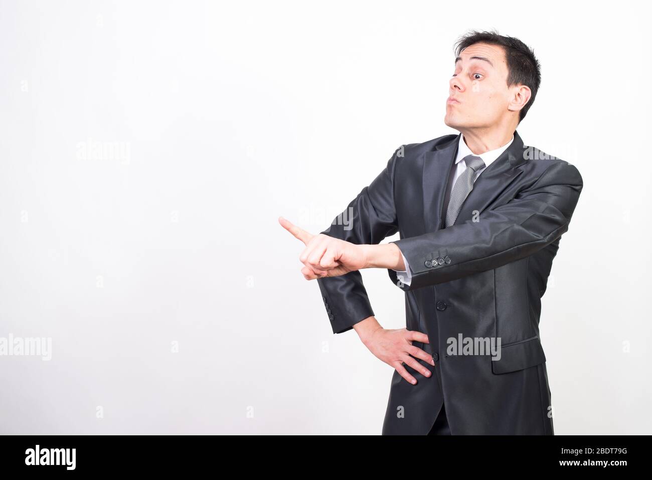 Man in suit scolding someone. White background, Medium shot Stock Photo ...
