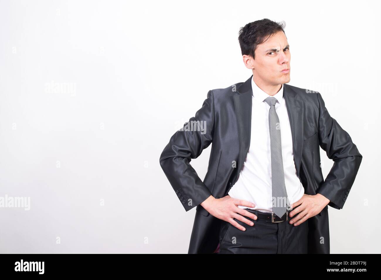 Man in suit scolding someone. White background, Medium shot Stock Photo ...