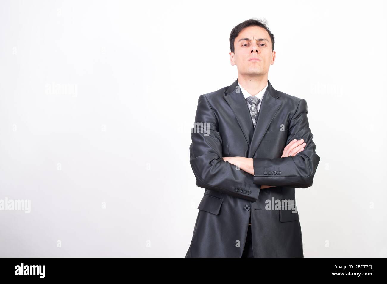Serious man in suit. White background, Medium shot Stock Photo - Alamy