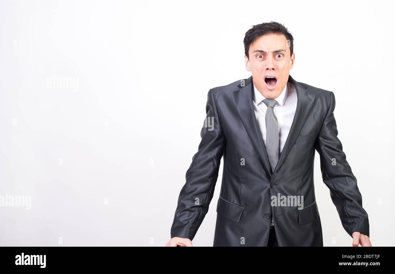 Scared man in suit on white background, medium shot Stock Photo - Alamy
