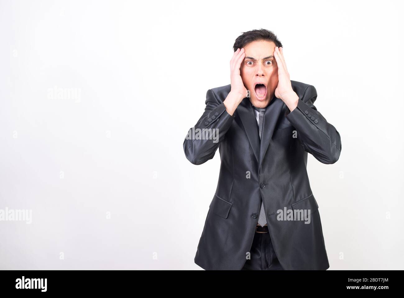 Scared man in suit on white background, medium shot Stock Photo - Alamy