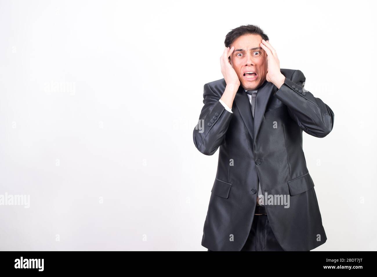 Scared man in suit on white background, medium shot Stock Photo - Alamy