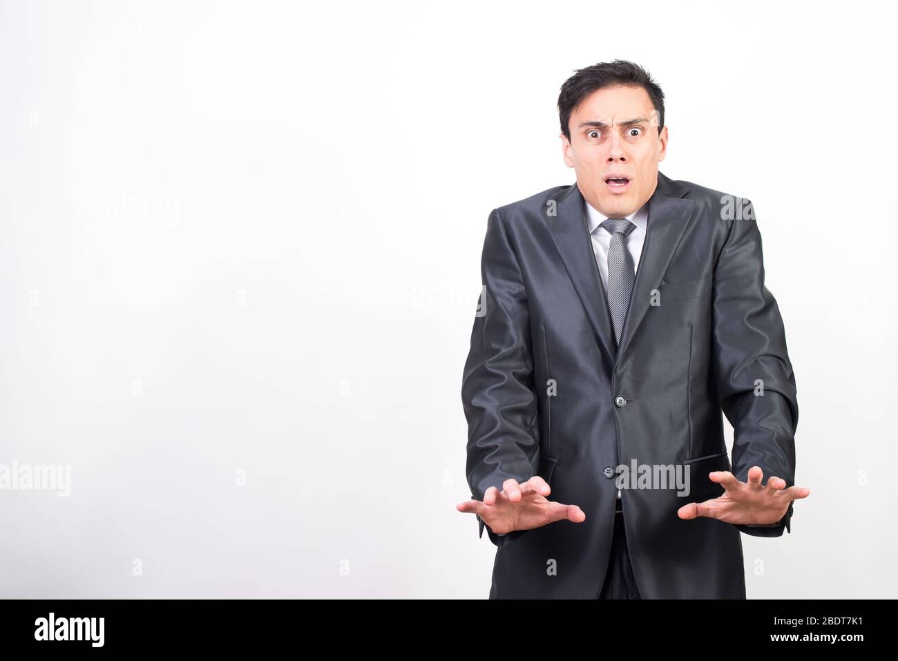 Scared man in suit on white background, medium shot Stock Photo - Alamy