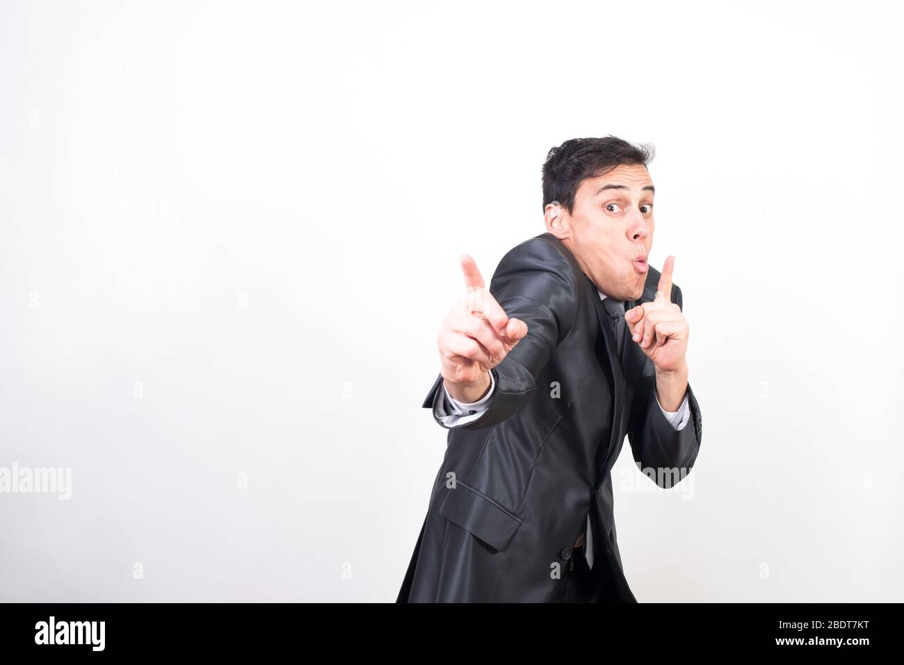 Silly man in suit. White background, Medium shot Stock Photo - Alamy