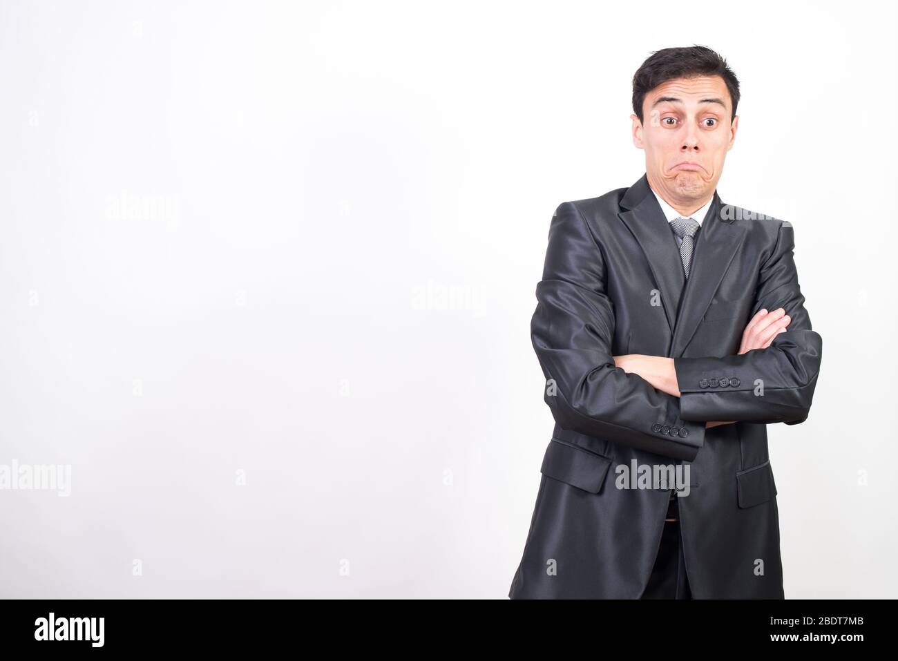 Surprised man in suit. White background, Medium shot Stock Photo - Alamy