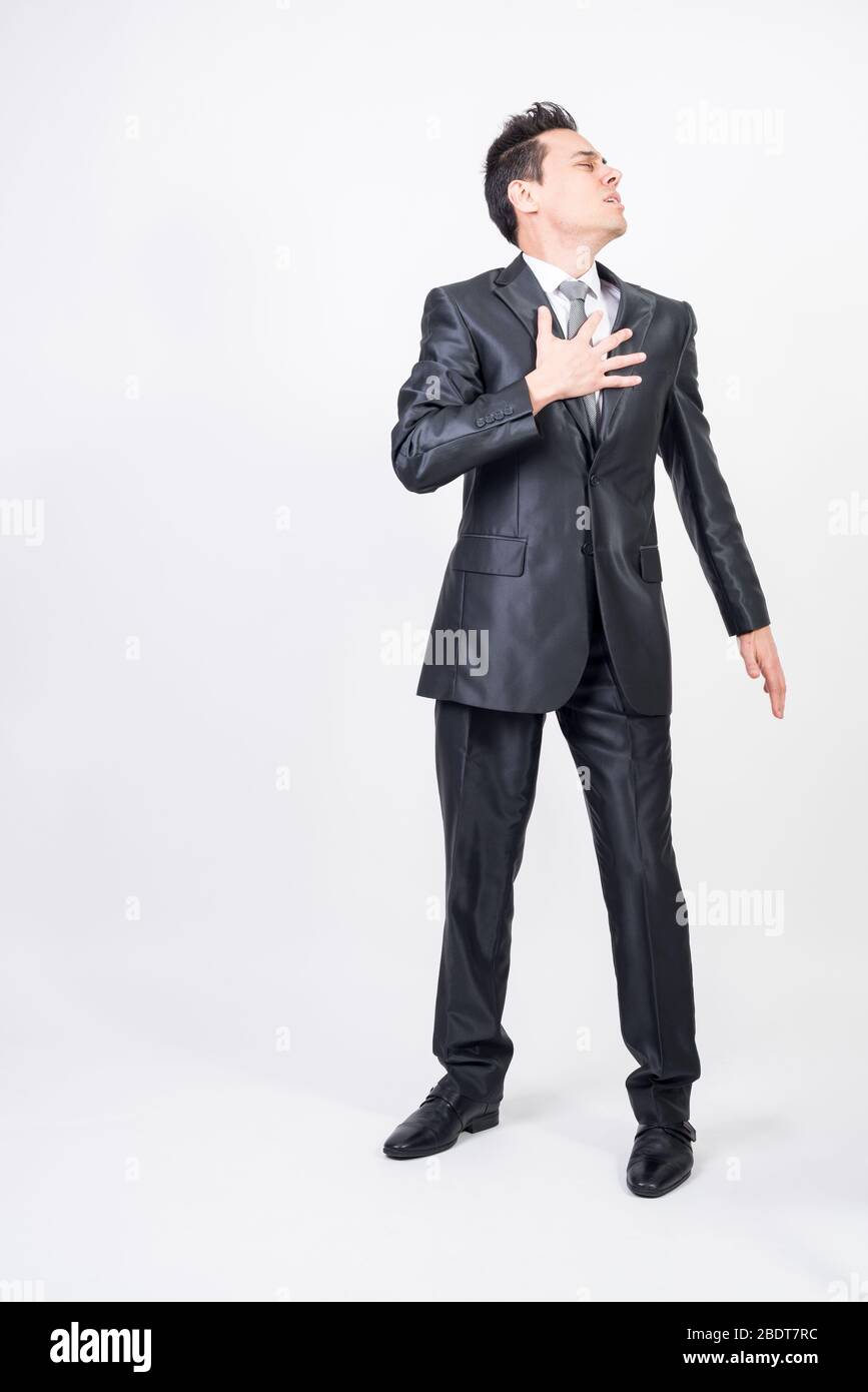 Angry man in suit. white background, full body Stock Photo - Alamy