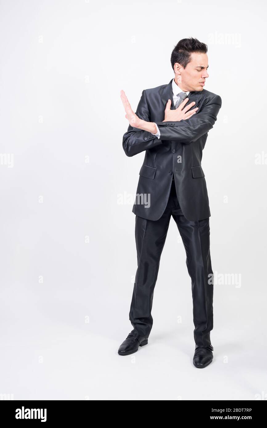 Angry man in suit. white background, full body Stock Photo - Alamy
