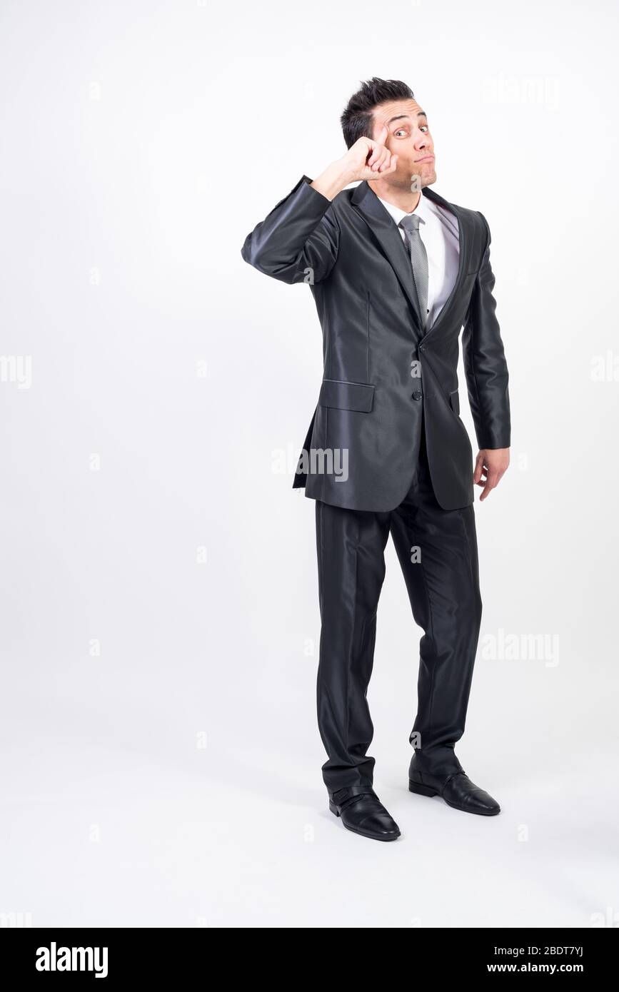 Clever man in suit. White background, full body Stock Photo - Alamy