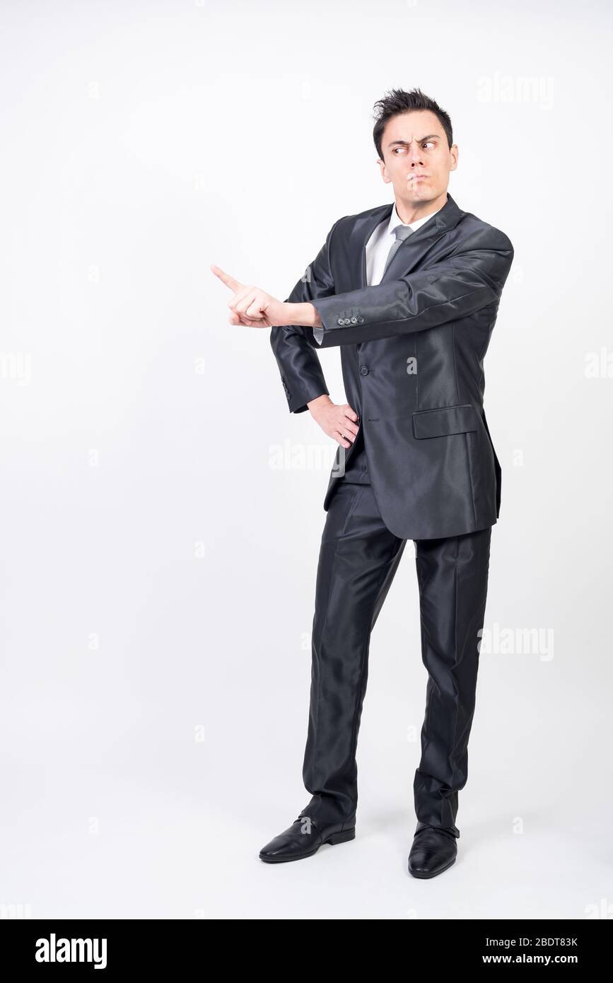 Man in suit scolding someone. White background, full body Stock Photo ...