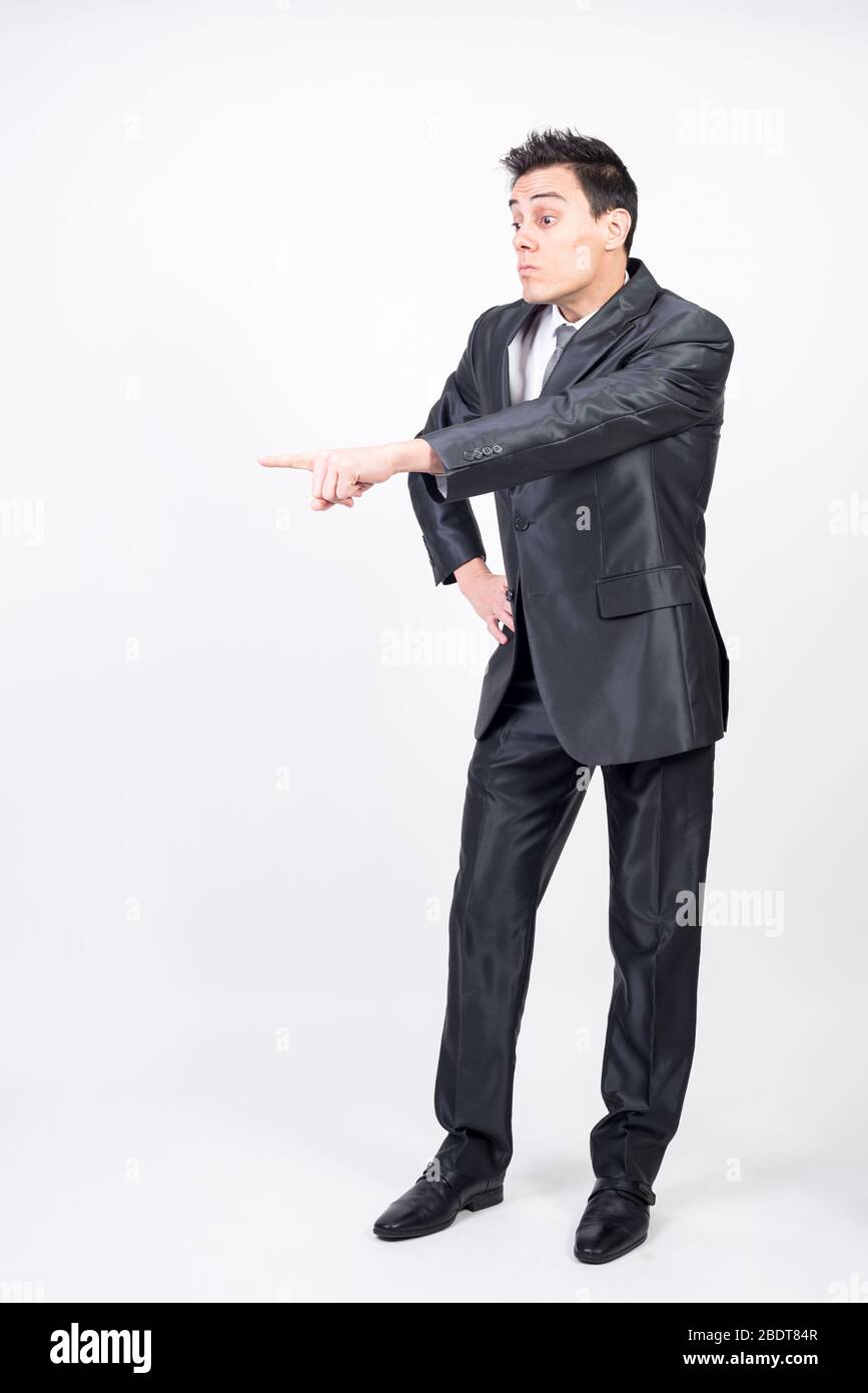 Man in suit scolding someone. White background, full body Stock Photo ...
