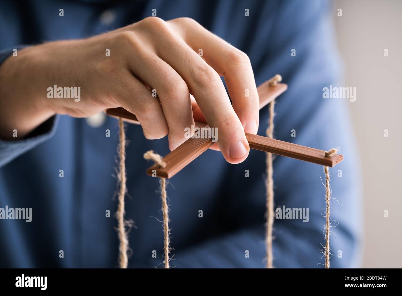Puppet strings men hi-res stock photography and images - Alamy