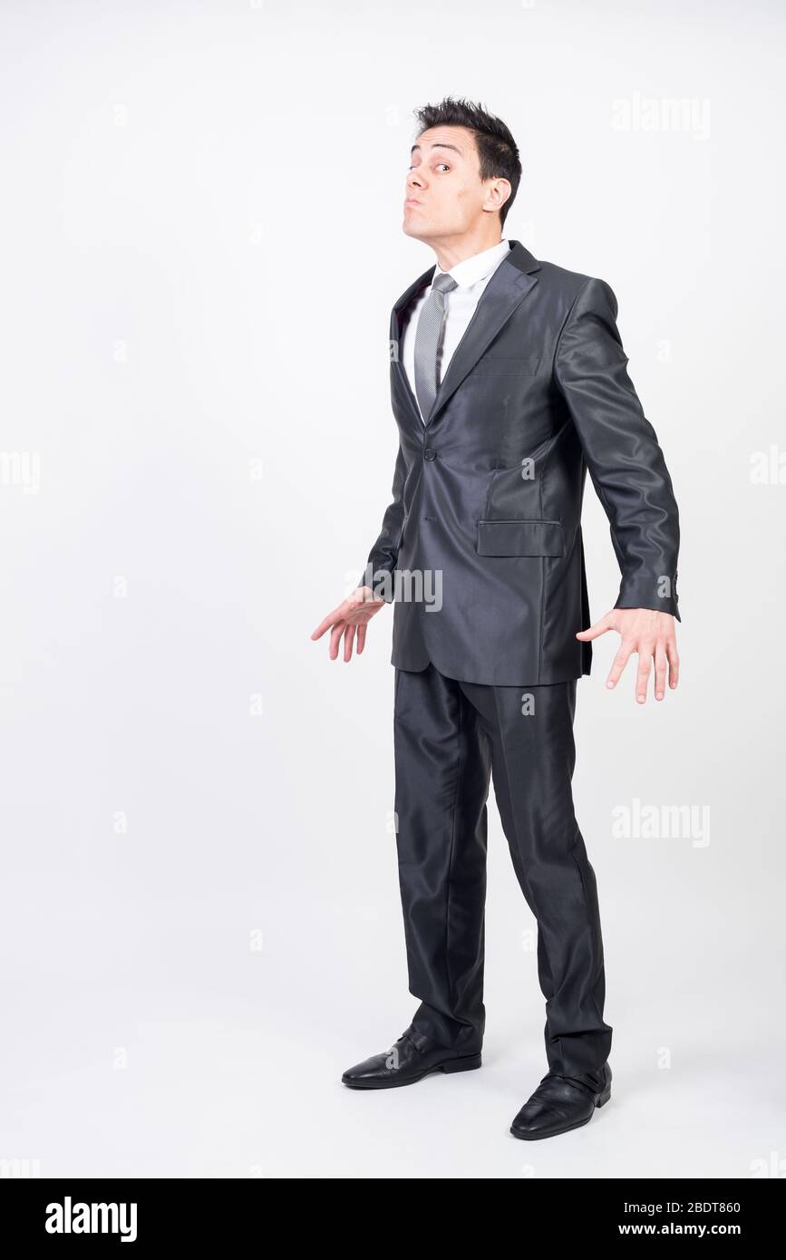 Man in suit scolding someone. White background, full body Stock Photo ...