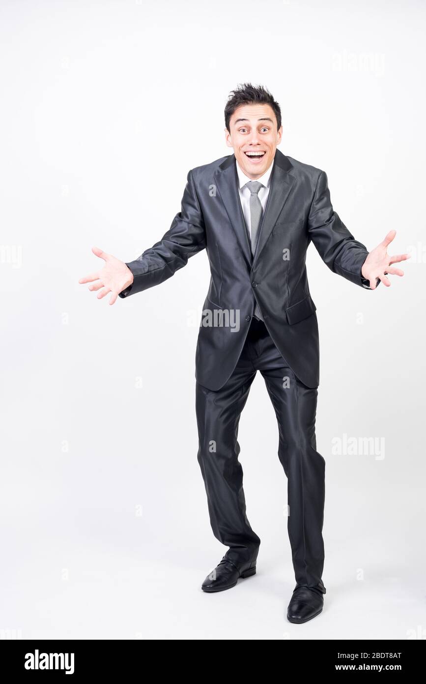 Smiling and happy man in suit. White background, full body Stock Photo ...