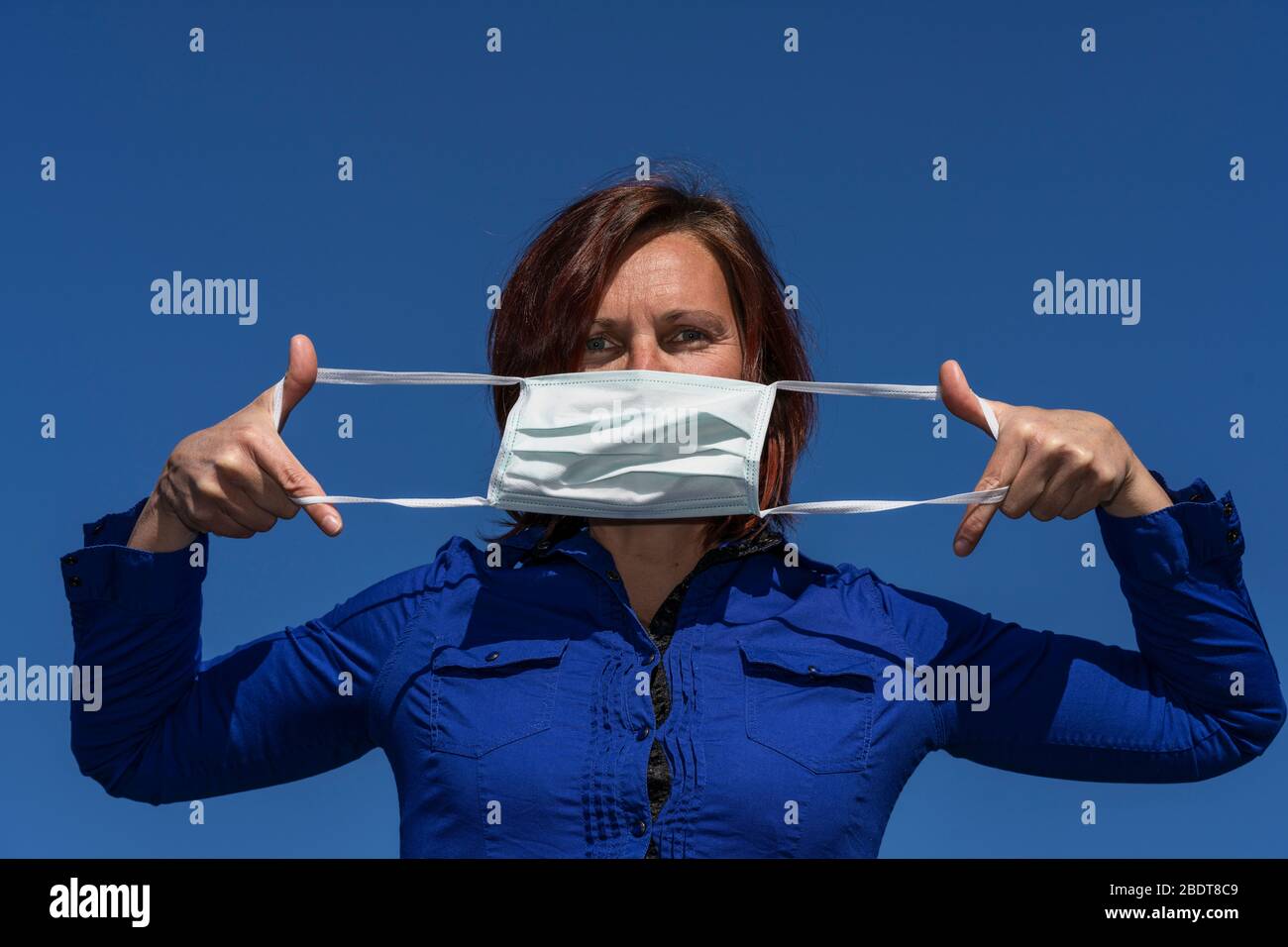 Put on a mask hi-res stock photography and images - Alamy