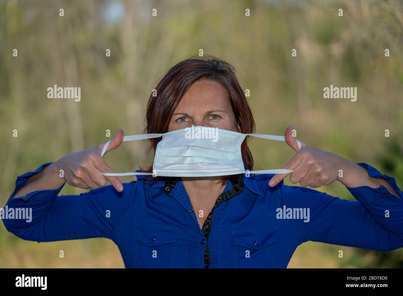 Put on the mask hi-res stock photography and images - Alamy