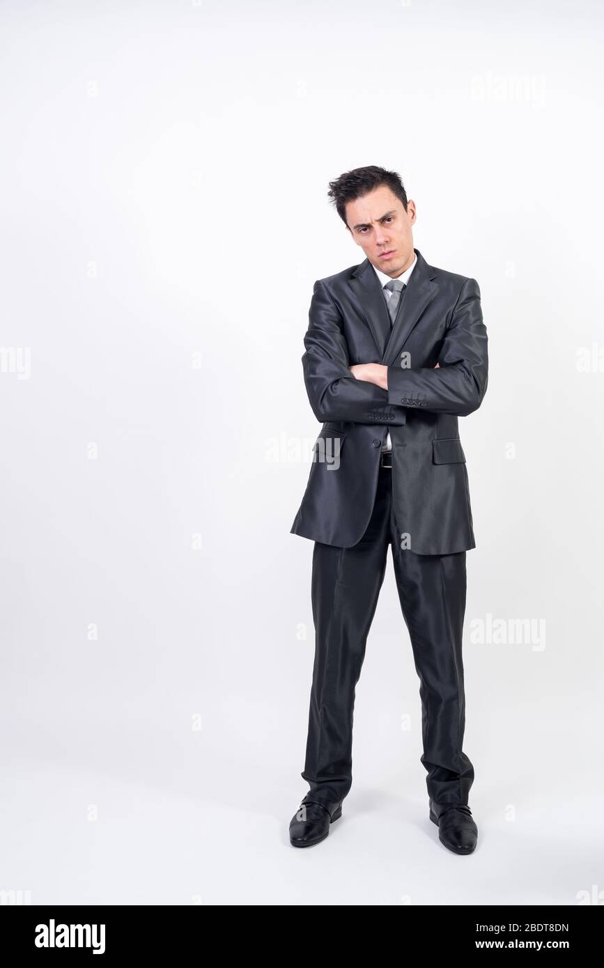 Bored man in suit on white background, full body Stock Photo - Alamy