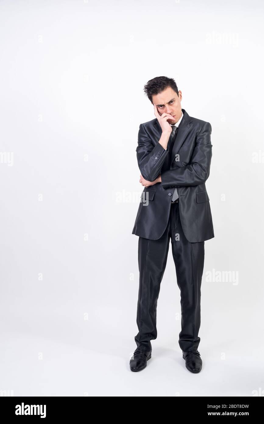 Bored man in suit on white background, full body Stock Photo - Alamy