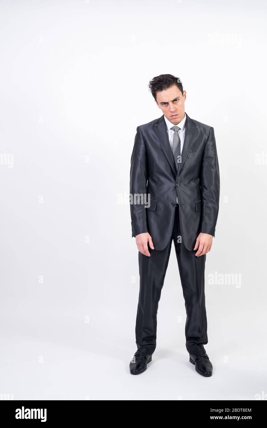 Bored man in suit on white background, full body Stock Photo - Alamy