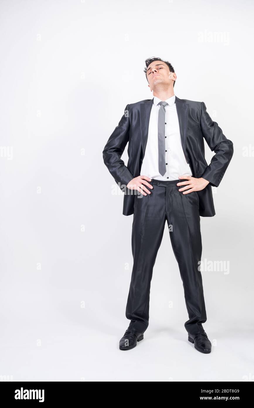 Vigilant man in suit. White background, full body Stock Photo - Alamy