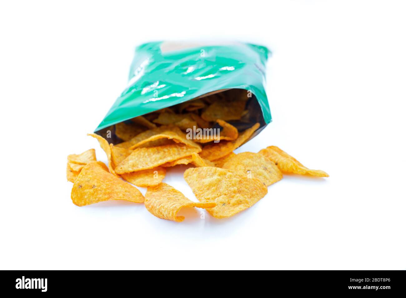 Heap of open packages and corn chip Stock Photo - Alamy