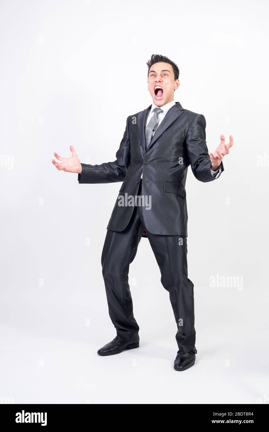 Screaming man in suit. white background, full body Stock Photo - Alamy