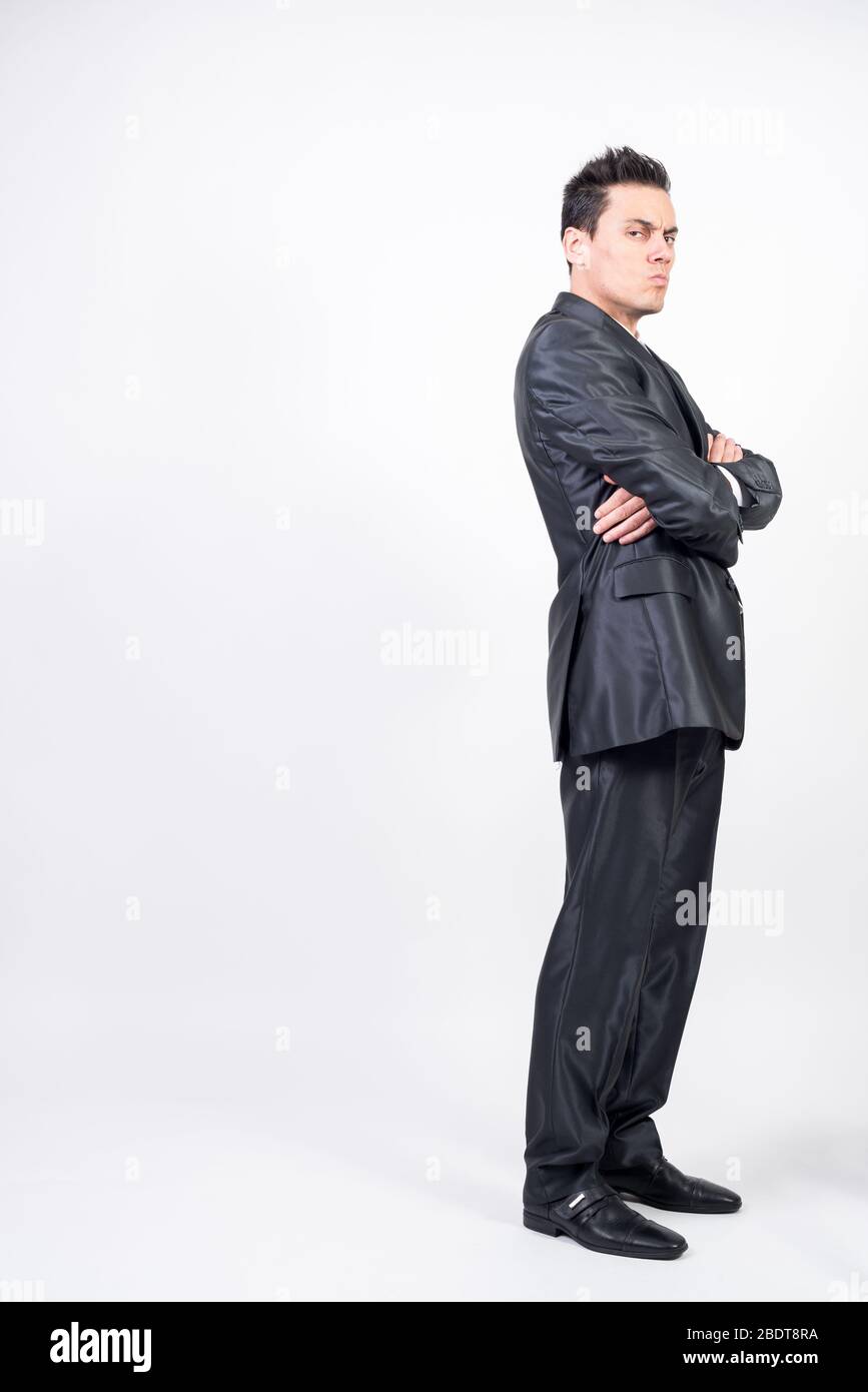Angry man in suit. white background, full body Stock Photo - Alamy