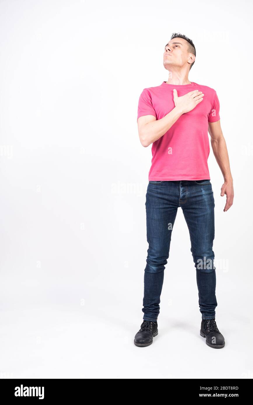 Honest man with hand in heart, white background, full body Stock Photo ...