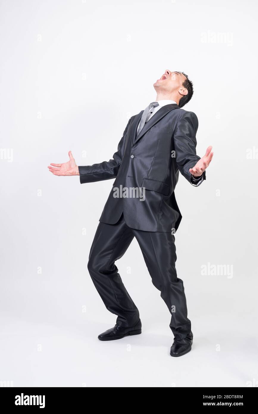 Screaming man in suit. white background, full body Stock Photo - Alamy