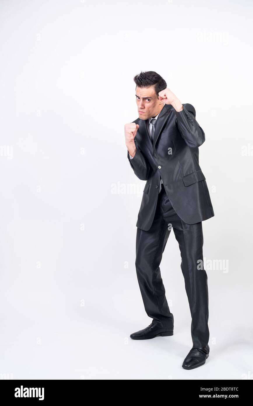 Angry man in suit. white background, full body Stock Photo - Alamy