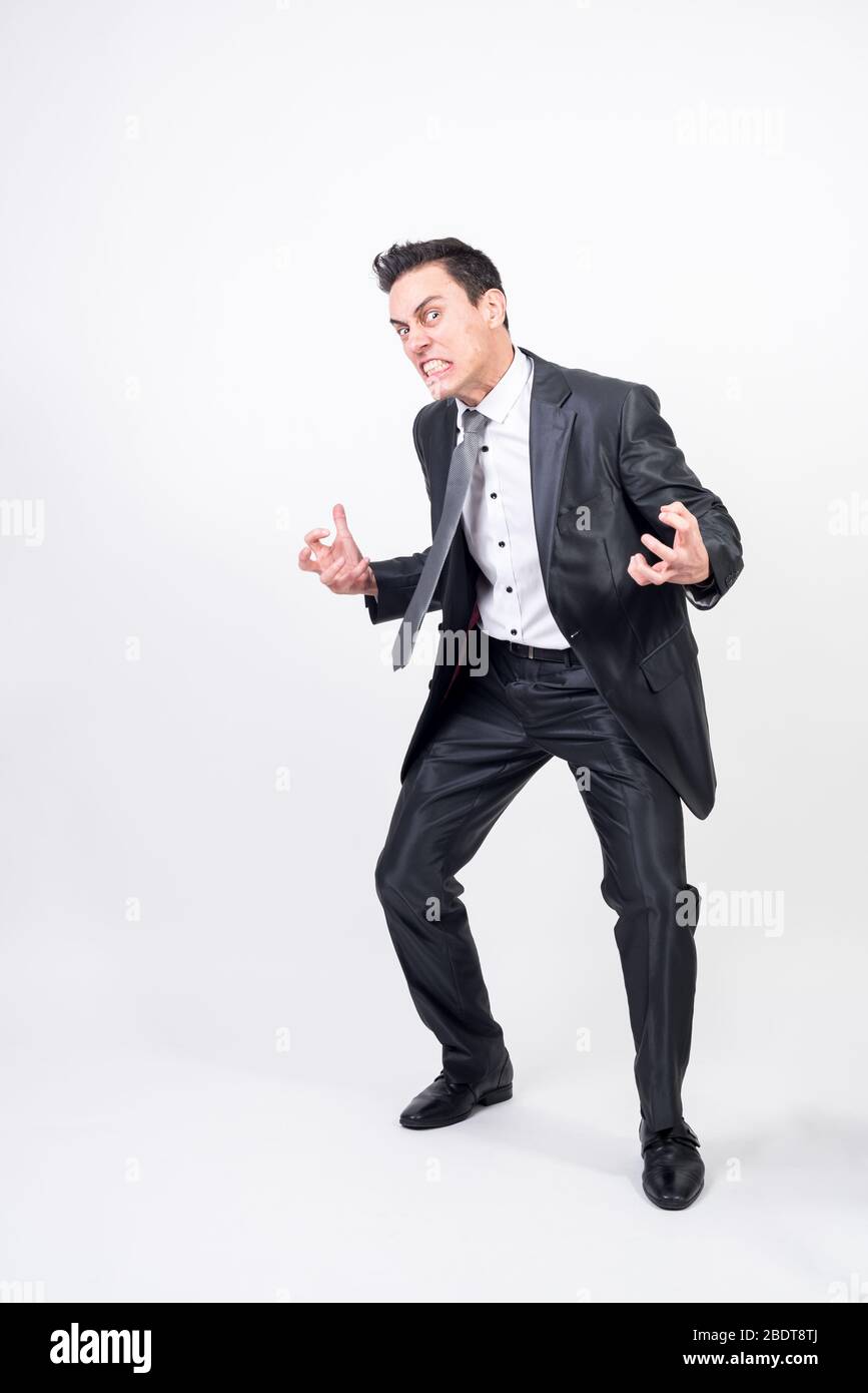 Hysterical man in suit. White background, full body Stock Photo - Alamy