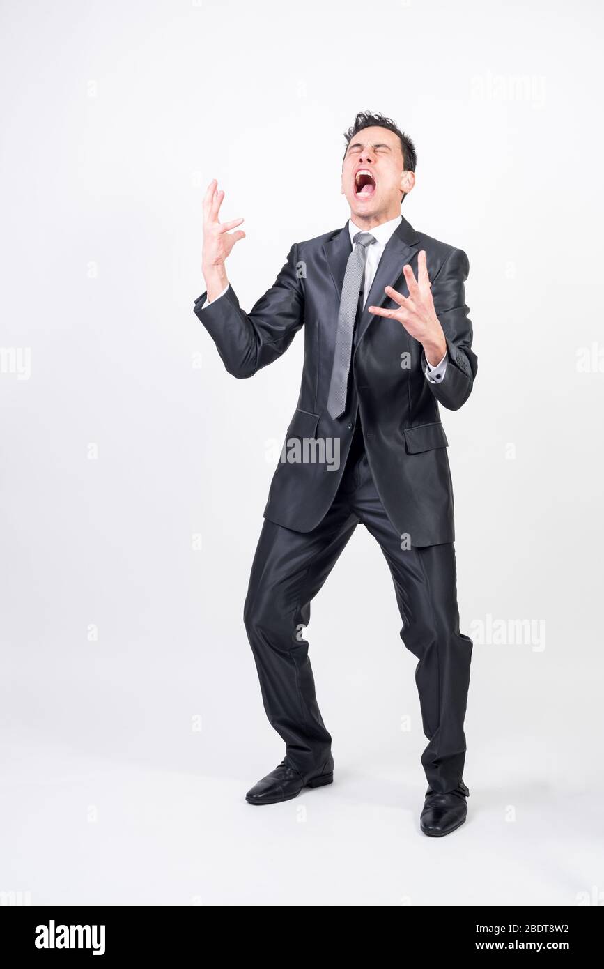 Hysterical man in suit. White background, full body Stock Photo - Alamy