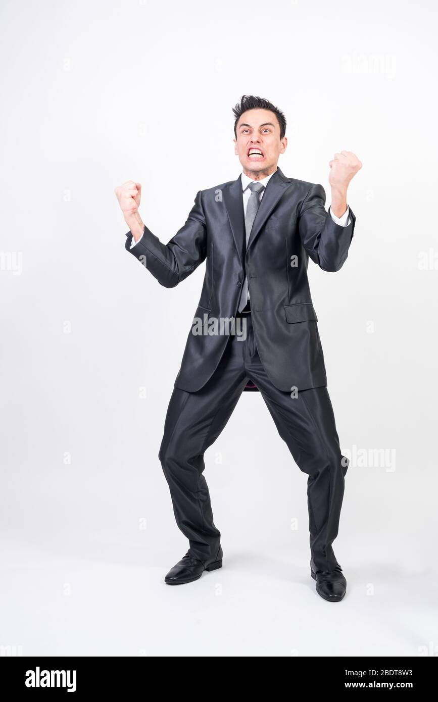 Hysterical man in suit. White background, full body Stock Photo - Alamy