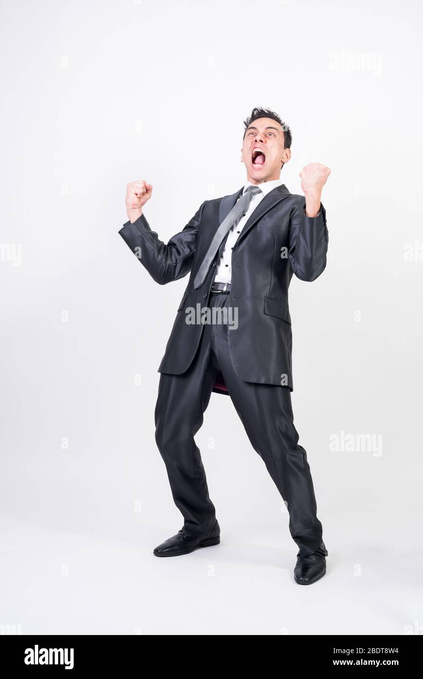 Hysterical man in suit. White background, full body Stock Photo - Alamy