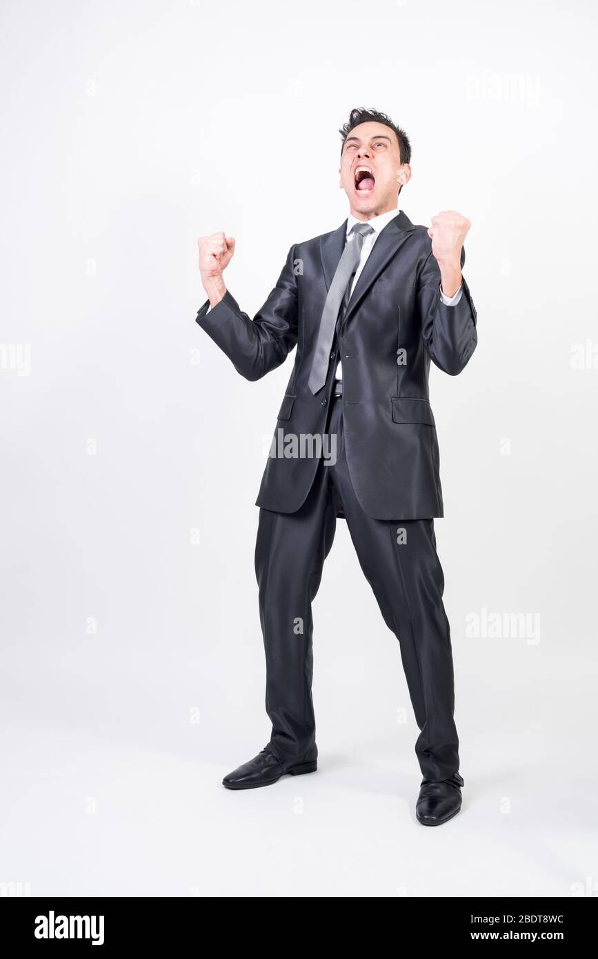 Hysterical man in suit. White background, full body Stock Photo - Alamy