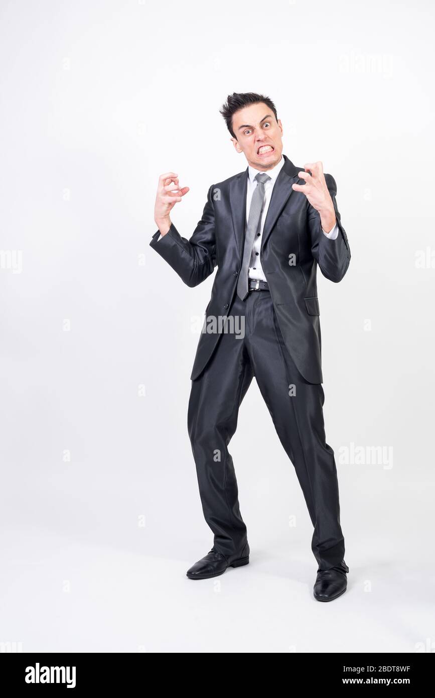 Hysterical man in suit. White background, full body Stock Photo - Alamy