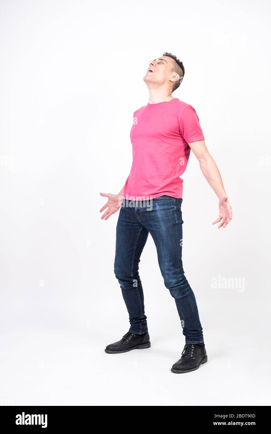 Man feeling pleasure. White background, full body Stock Photo - Alamy