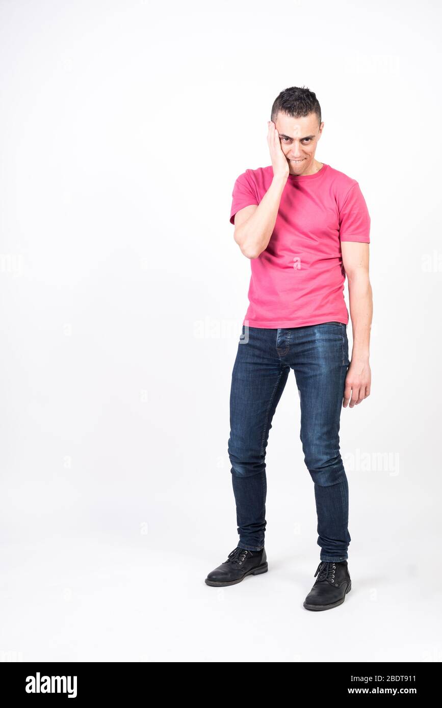 Man feeling pleasure. White background, full body Stock Photo - Alamy