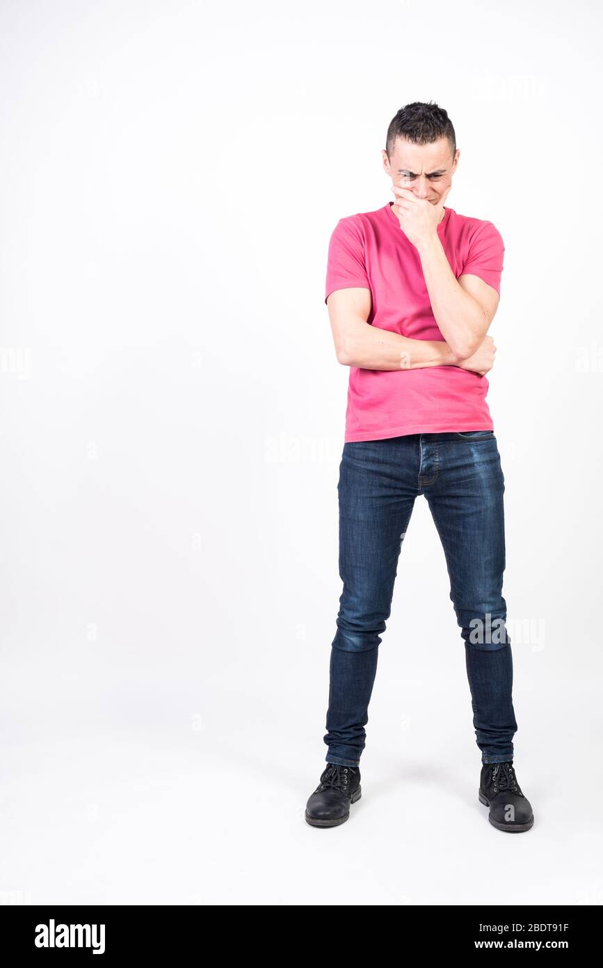 Worried man. White background, full body Stock Photo - Alamy