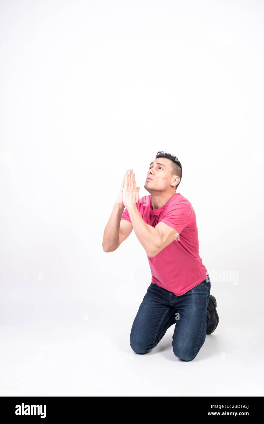 Man praying. White background, full body Stock Photo - Alamy
