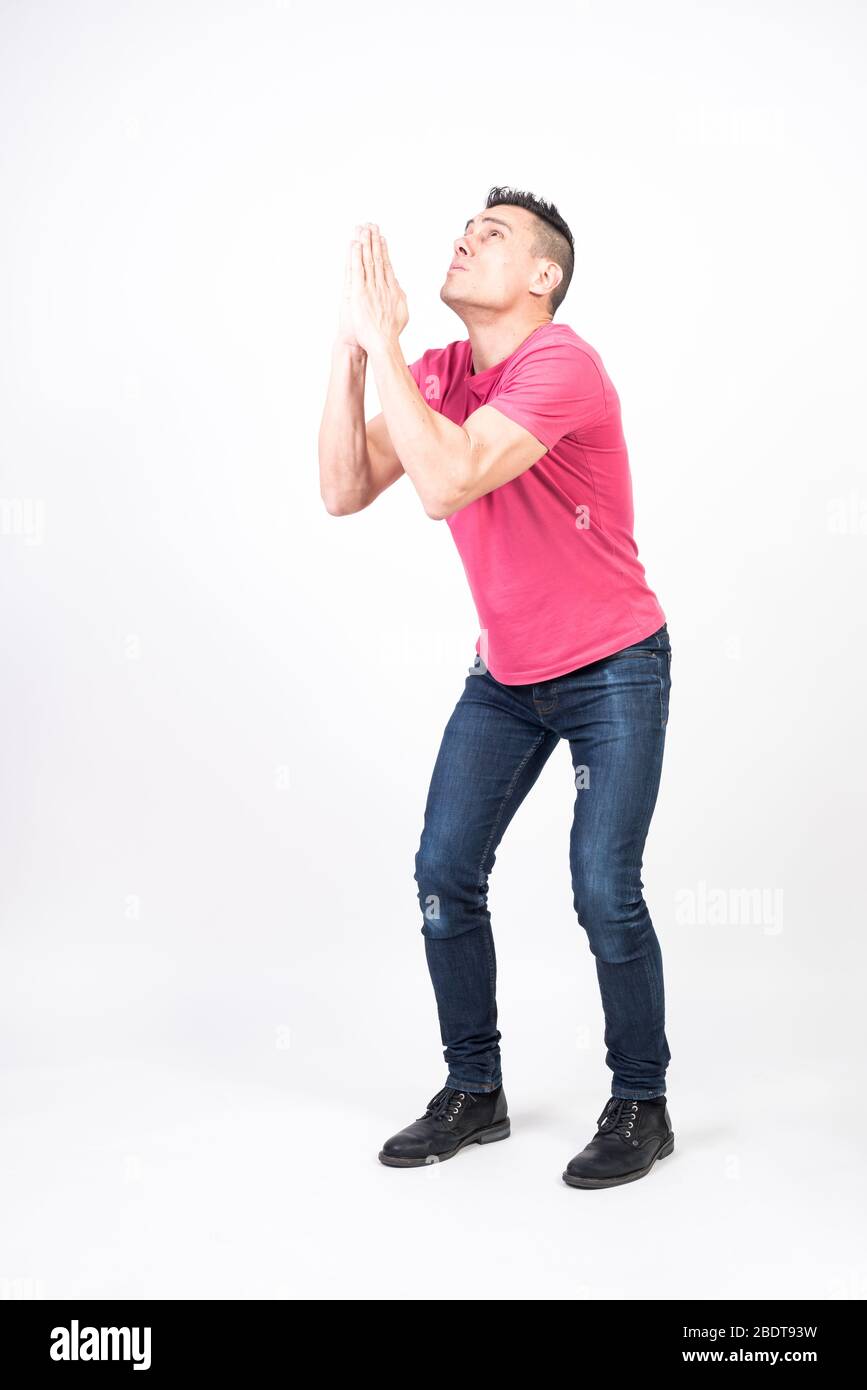 Man praying. White background, full body Stock Photo - Alamy